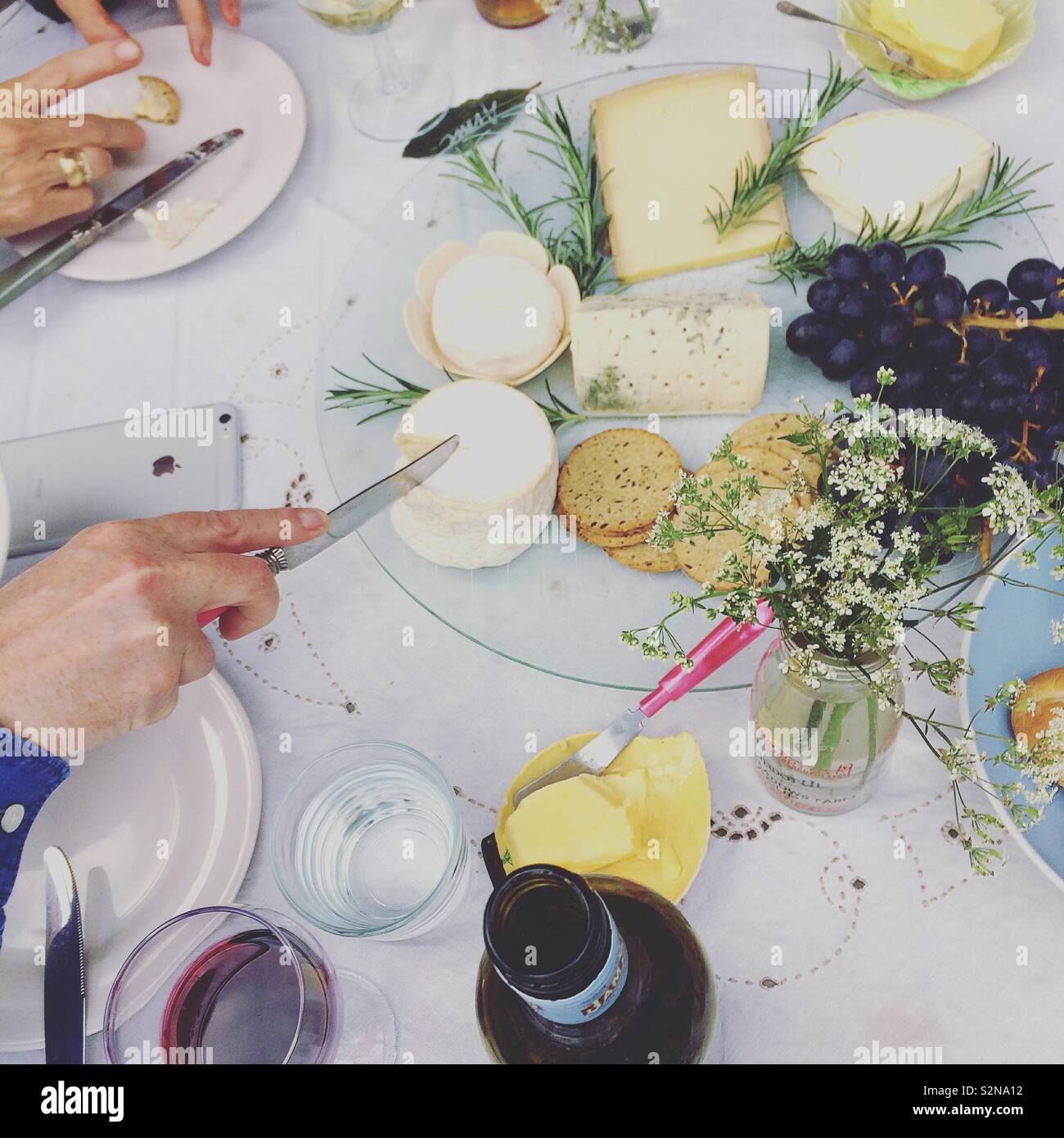 A long lunch with friends ending in a cheeseboard Stock Photo - Alamy