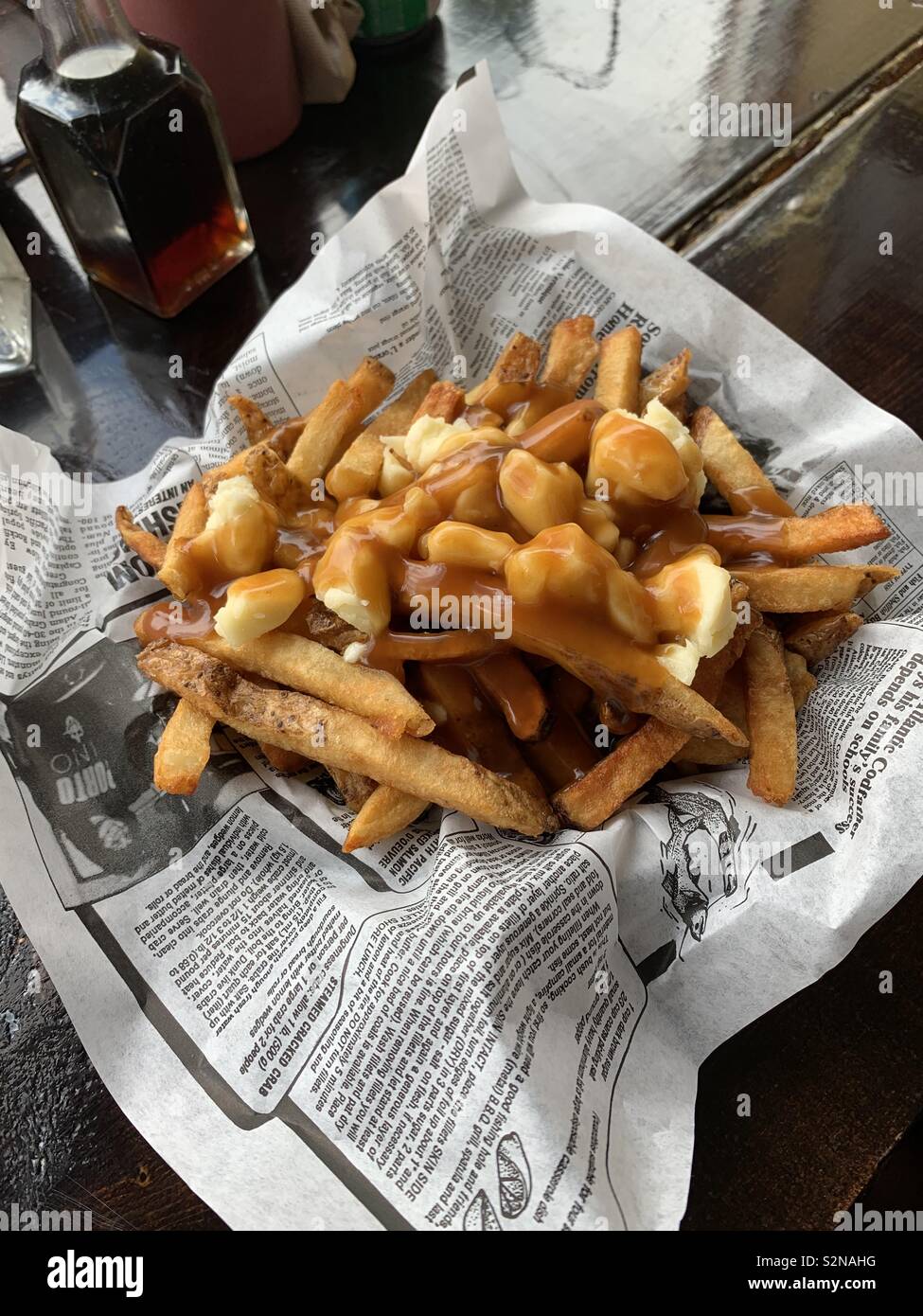 Poutine frites hi-res stock photography and images - Alamy