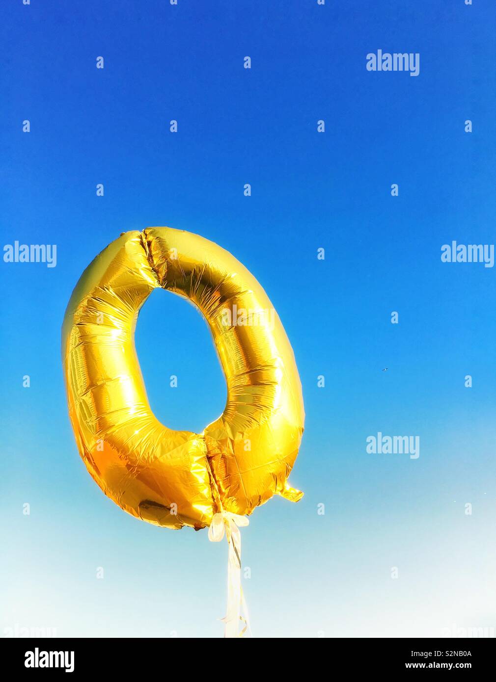 Gold balloon zero hi-res stock photography and images - Alamy