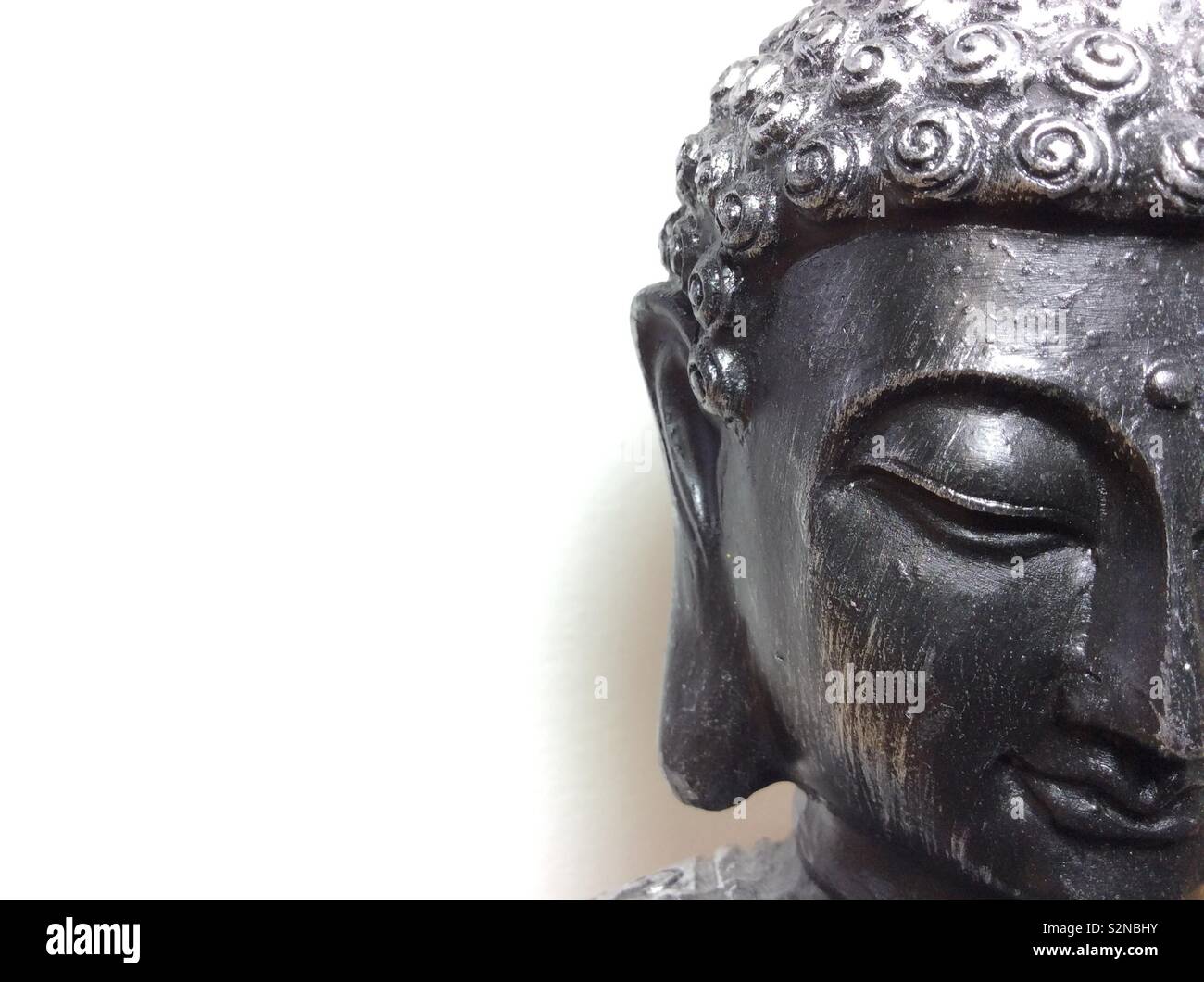 Half buddha face hi-res stock photography and images - Alamy