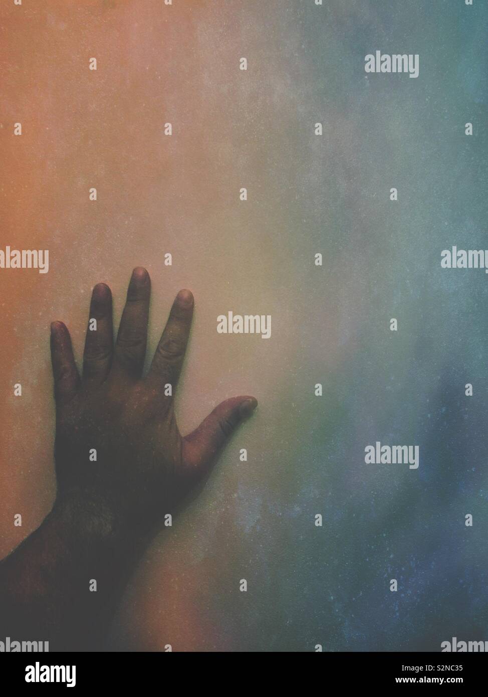 Man’s hand against the wall Stock Photo - Alamy