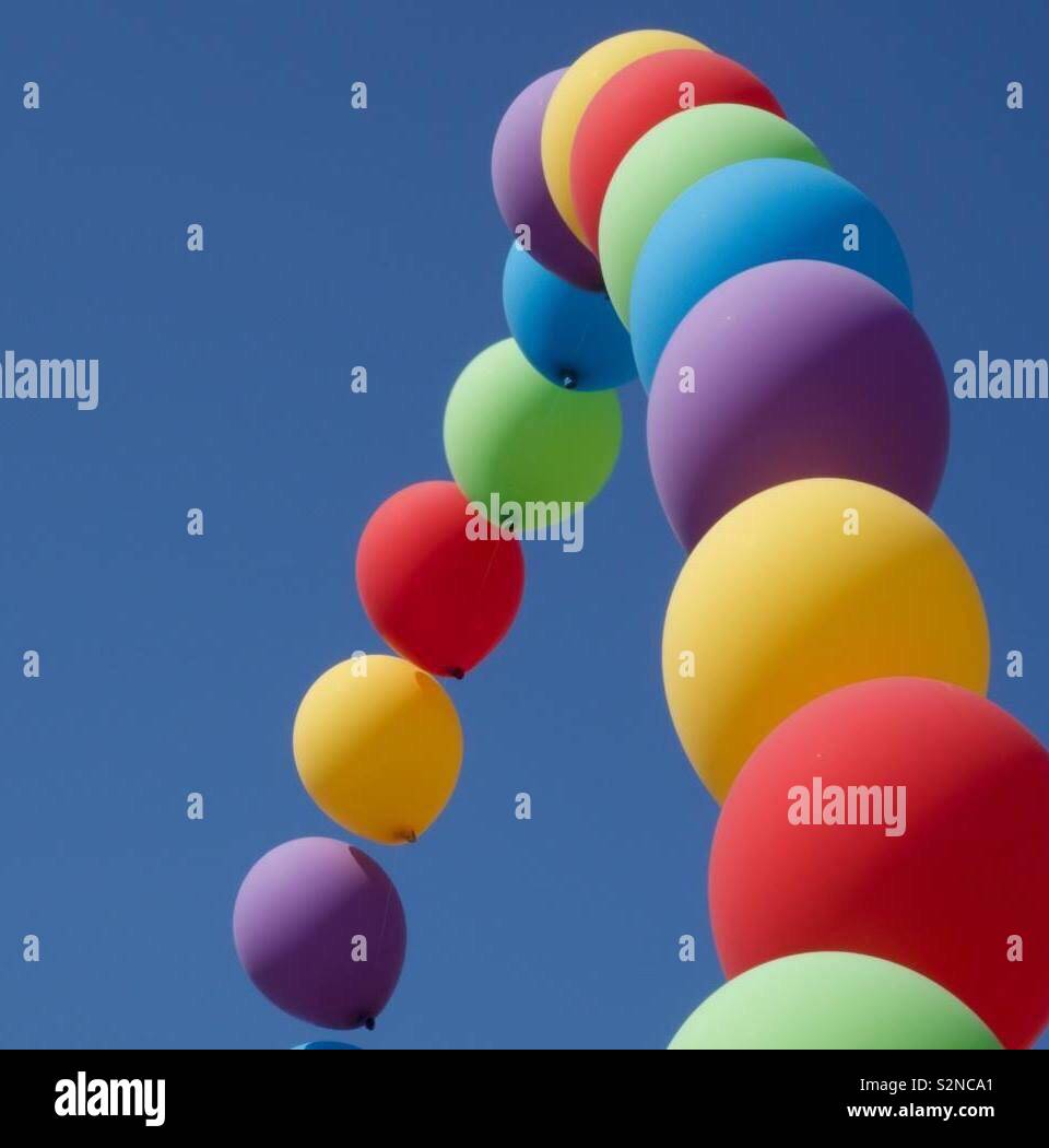 Rainbow colored balloons celebrating LGBT Stock Photo - Alamy