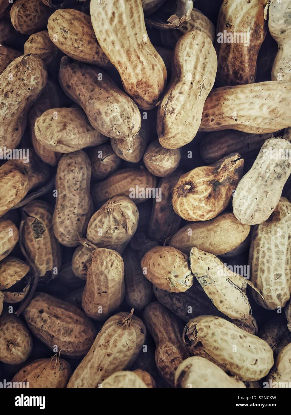 Pile peanuts in shells hi-res stock photography and images - Alamy