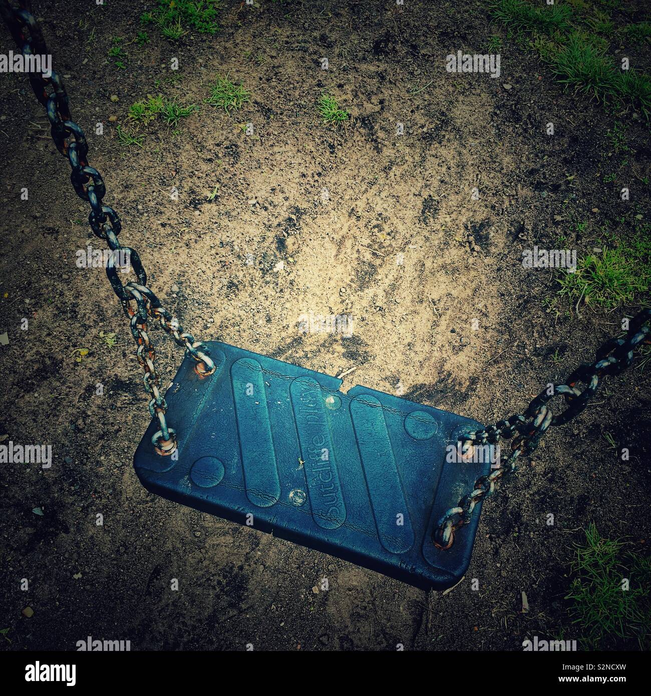 Empty childrens swing hi-res stock photography and images - Alamy