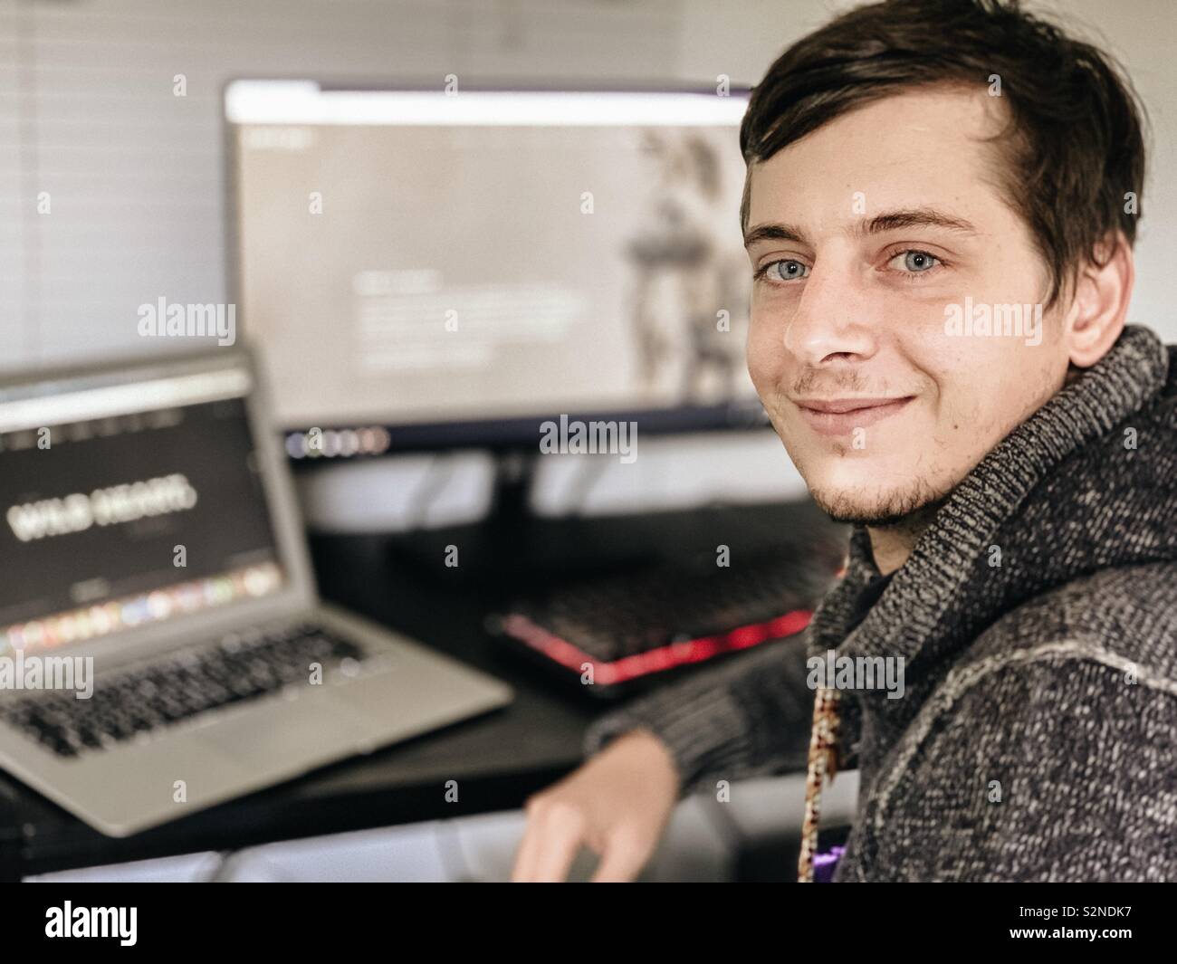 Boy working with computer hi-res stock photography and images - Alamy