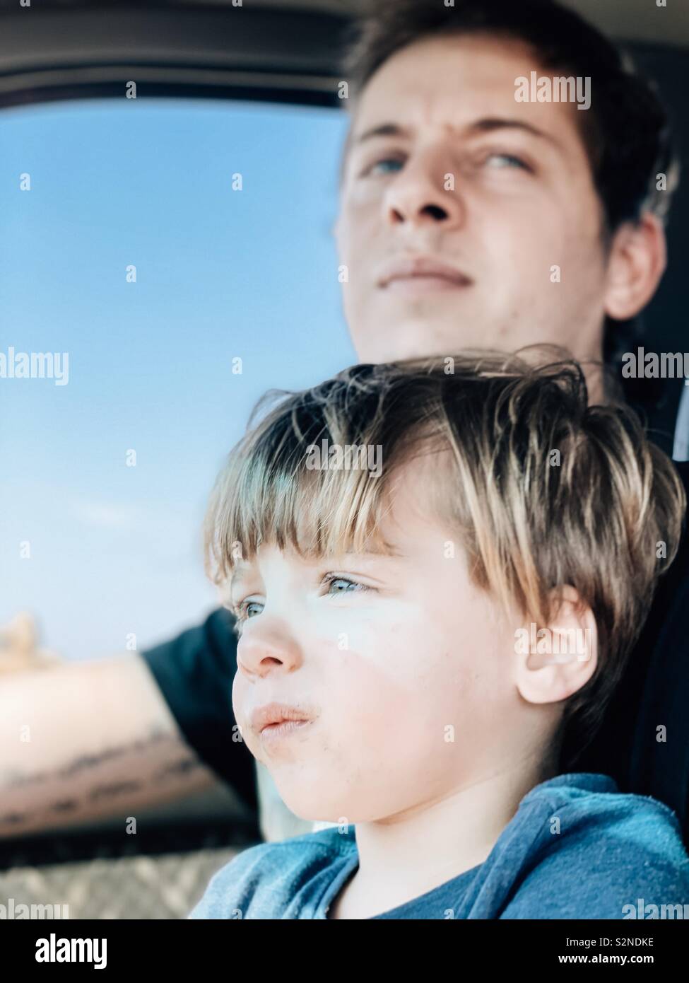 Father and son driving a car Stock Photo - Alamy