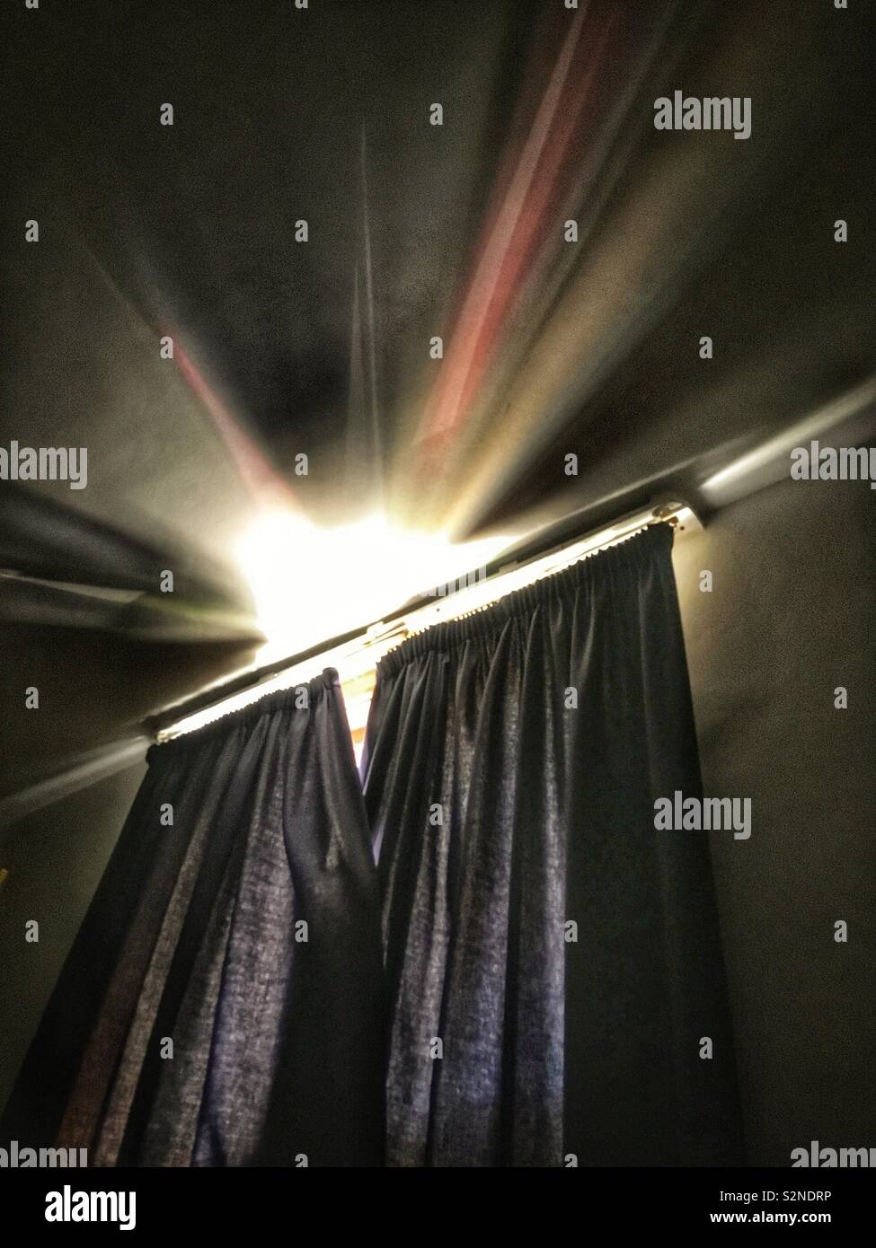 Morning sunlight coming through the curtains Stock Photo - Alamy