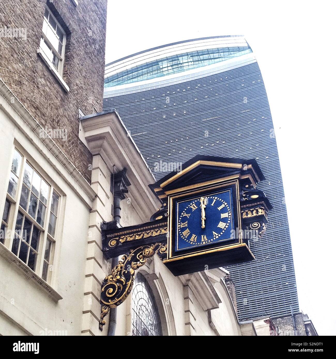 The ornate clock on the Sir Christopher Wren church of St Mary at Hill ...