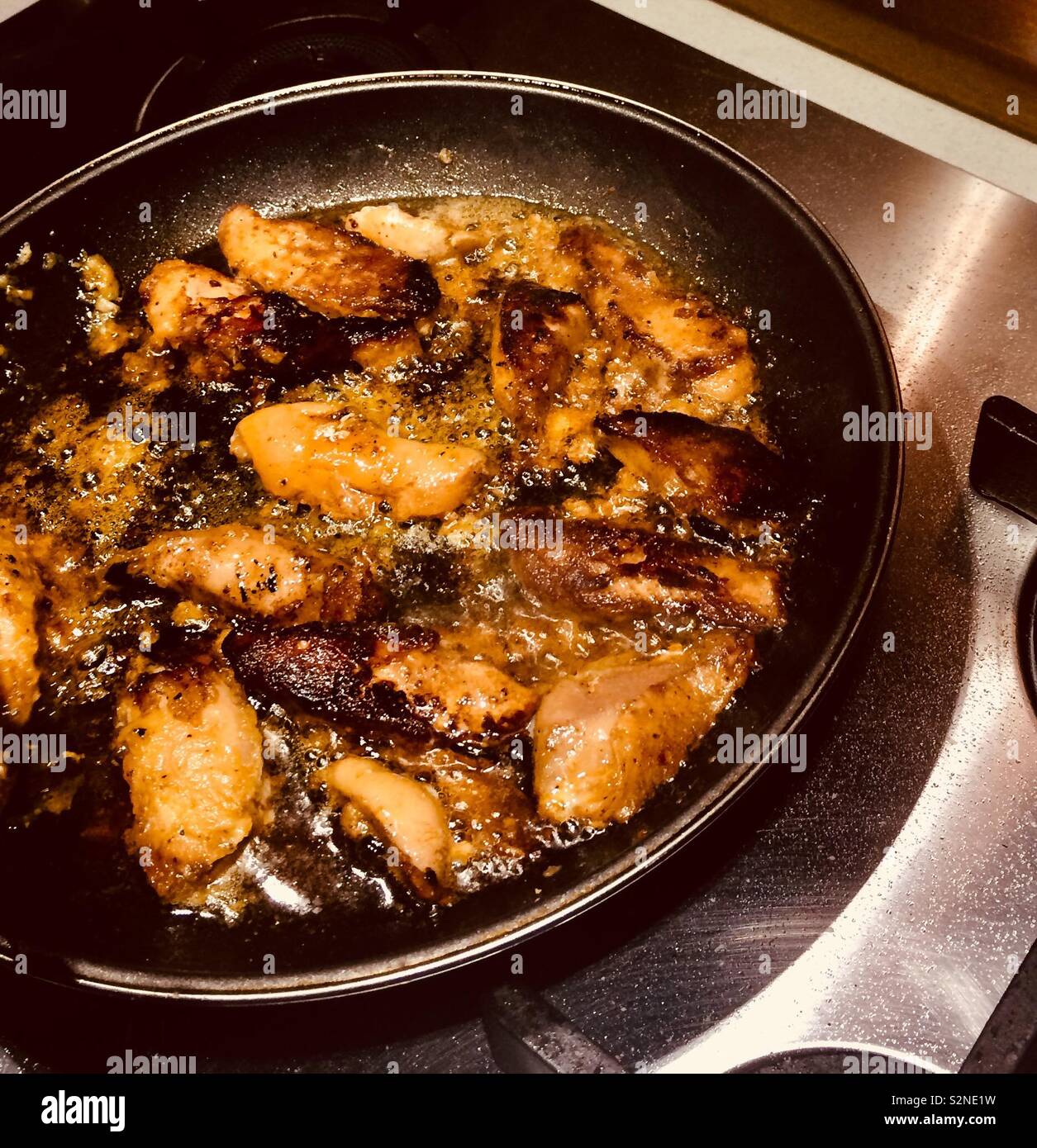 Sizzling pan hi-res stock photography and images - Alamy