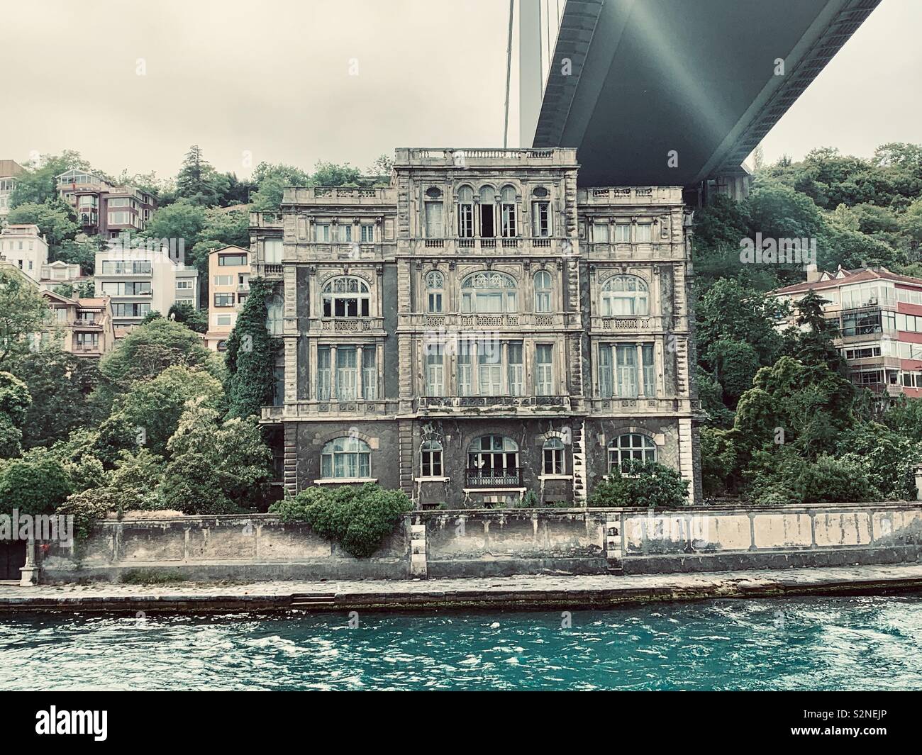 Modern bridge built over old mansion Stock Photo - Alamy