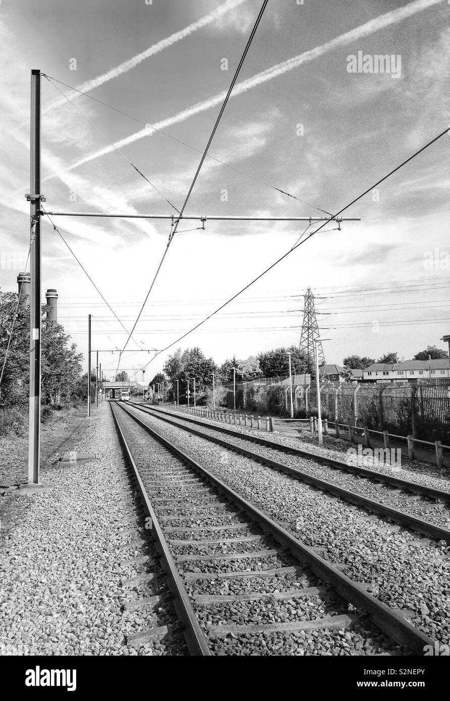 The converging tracks of a tramway in suburban London, England Stock ...