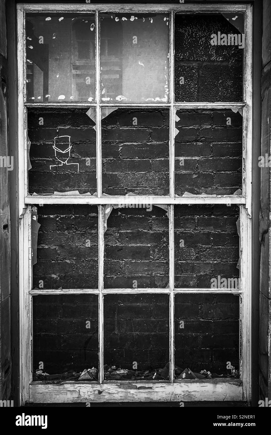 Broken glass brick wall brick wall Black and White Stock Photos ...