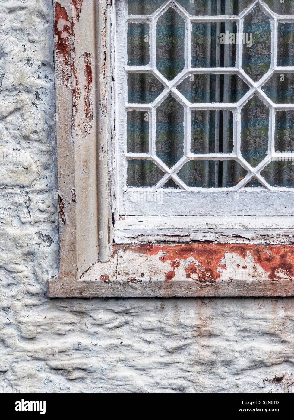 Decorative old window with weathered stone surround Stock Photo - Alamy