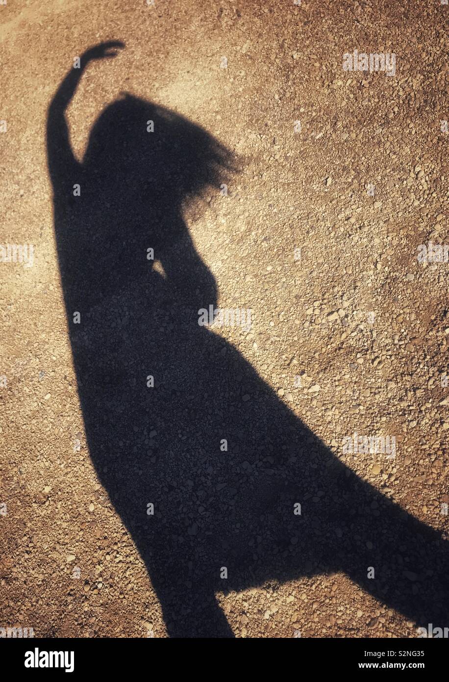Woman dancing shadow hi-res stock photography and images - Alamy