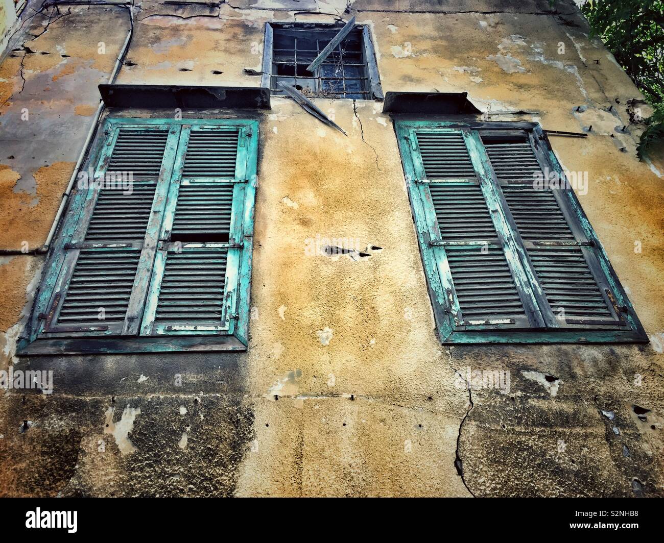 Broken window shutters Stock Photo - Alamy