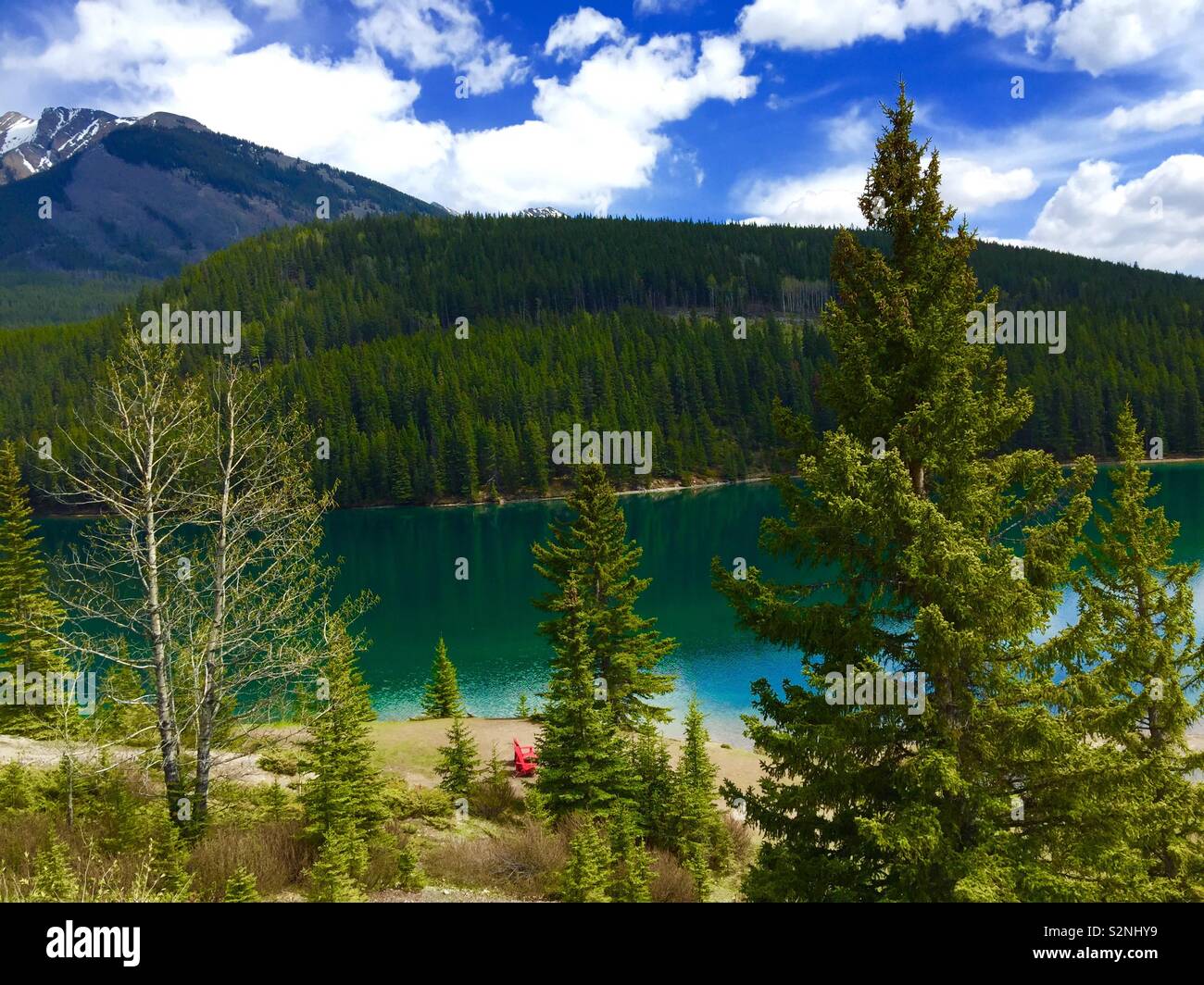 Two Jack Lake and two red chairs. Banff National Park, Alberta, Canada ...