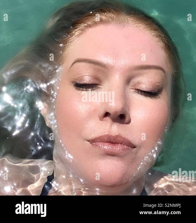 Long floating blond hair hi-res stock photography and images - Alamy