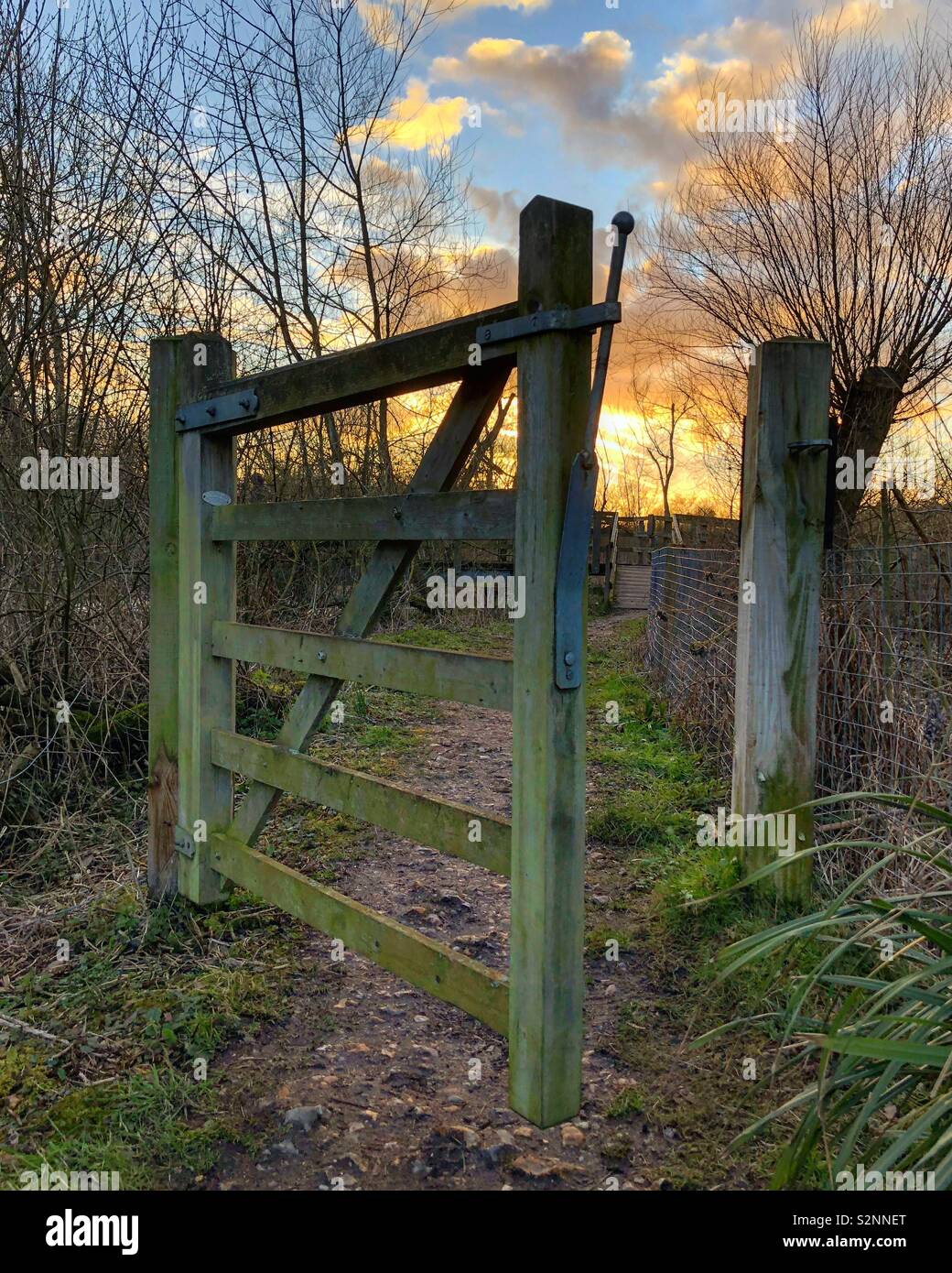 Open and shut gate Stock Photo - Alamy