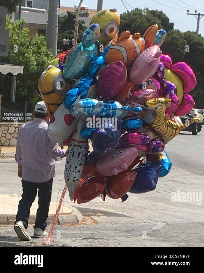 Street vendor selling balloons in hi-res stock photography and images ...