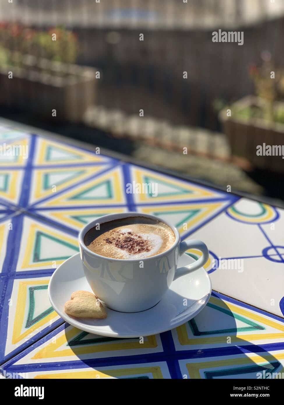 Coffee in the sun Stock Photo - Alamy