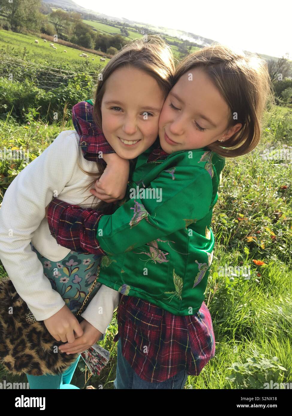 Sisters Hugging High Resolution Stock Photography and Images - Alamy