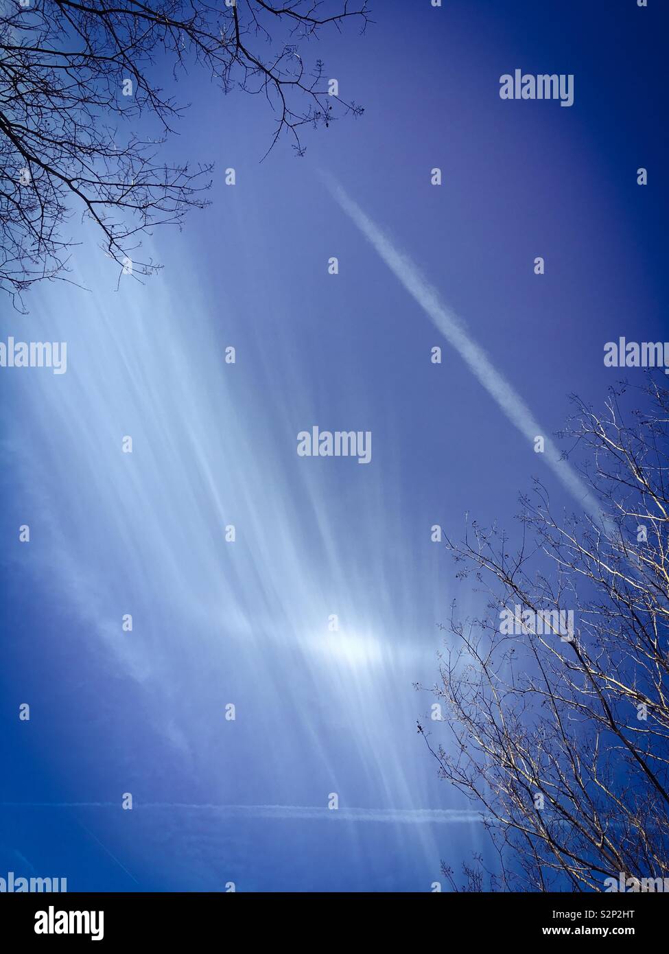 Spring sky with Sun Stock Photo - Alamy