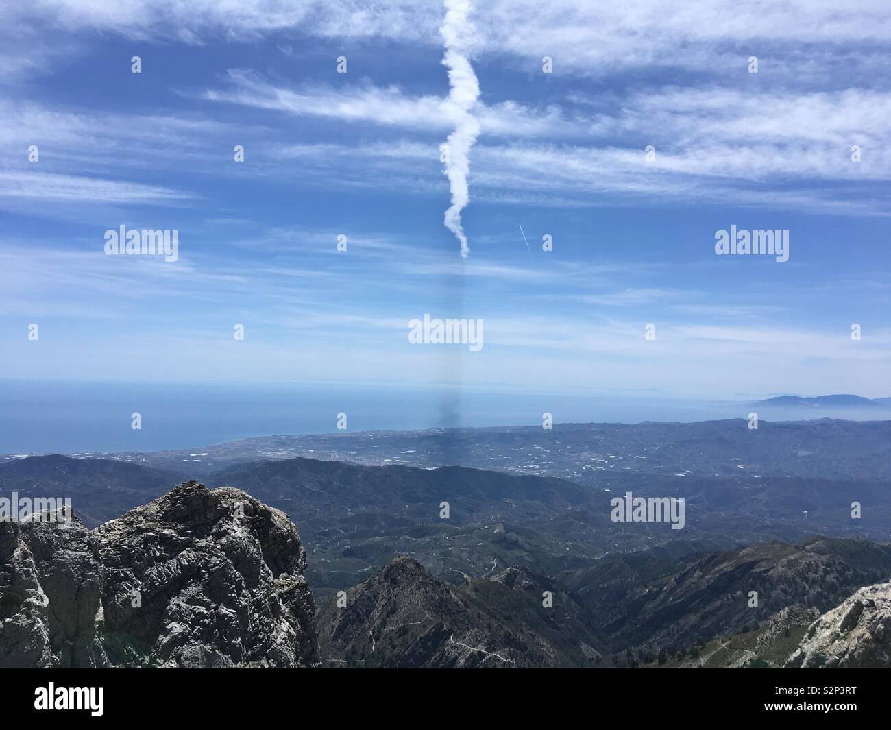 Plane trail shadow phenomenon Stock Photo - Alamy
