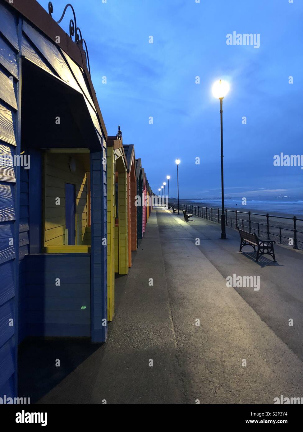 Beach huts at night Stock Photo - Alamy