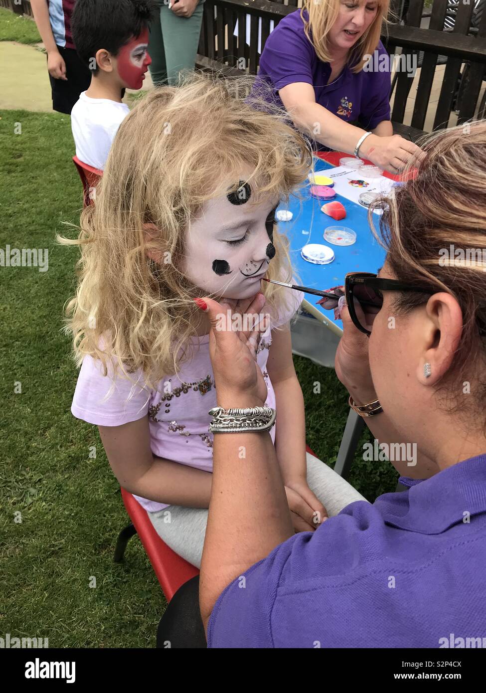 Children having face painted hi-res stock photography and images - Alamy