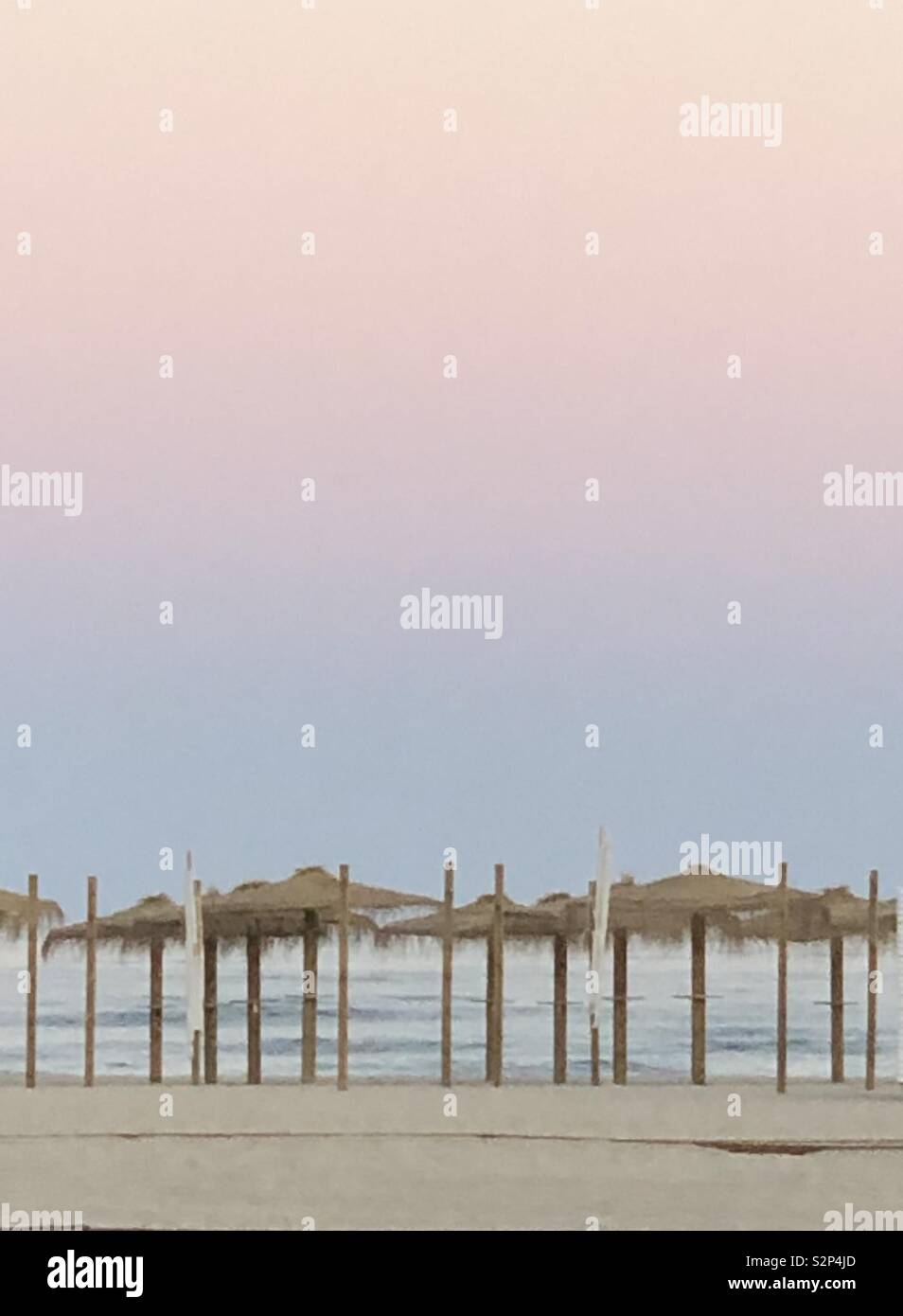 Sunset on an Algarve beach Stock Photo - Alamy