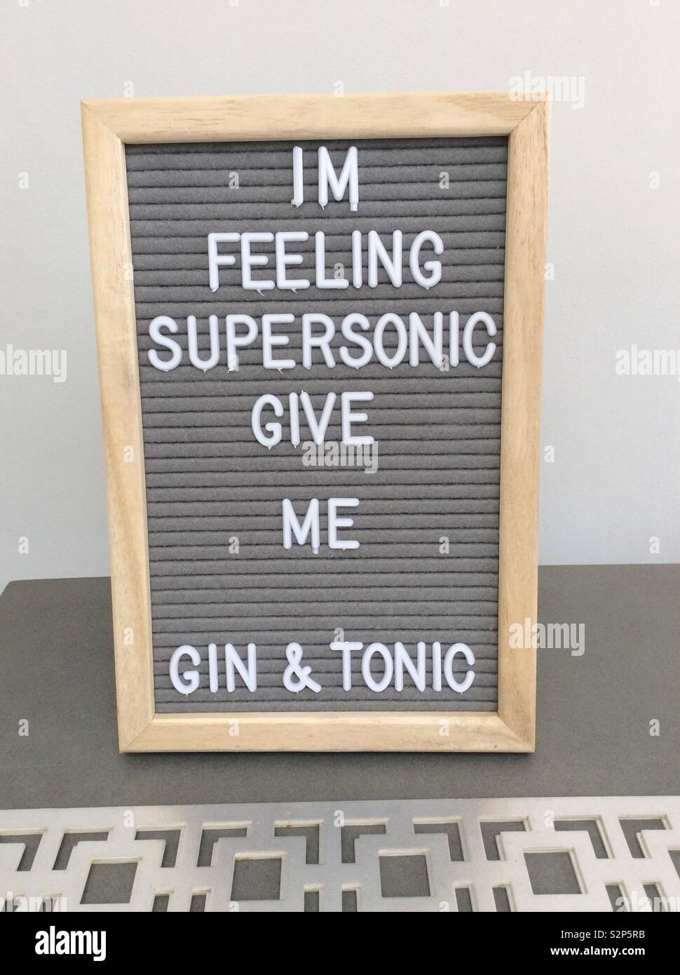 Notice board quote I’m feeling supersonic give me gin and tonic Stock ...