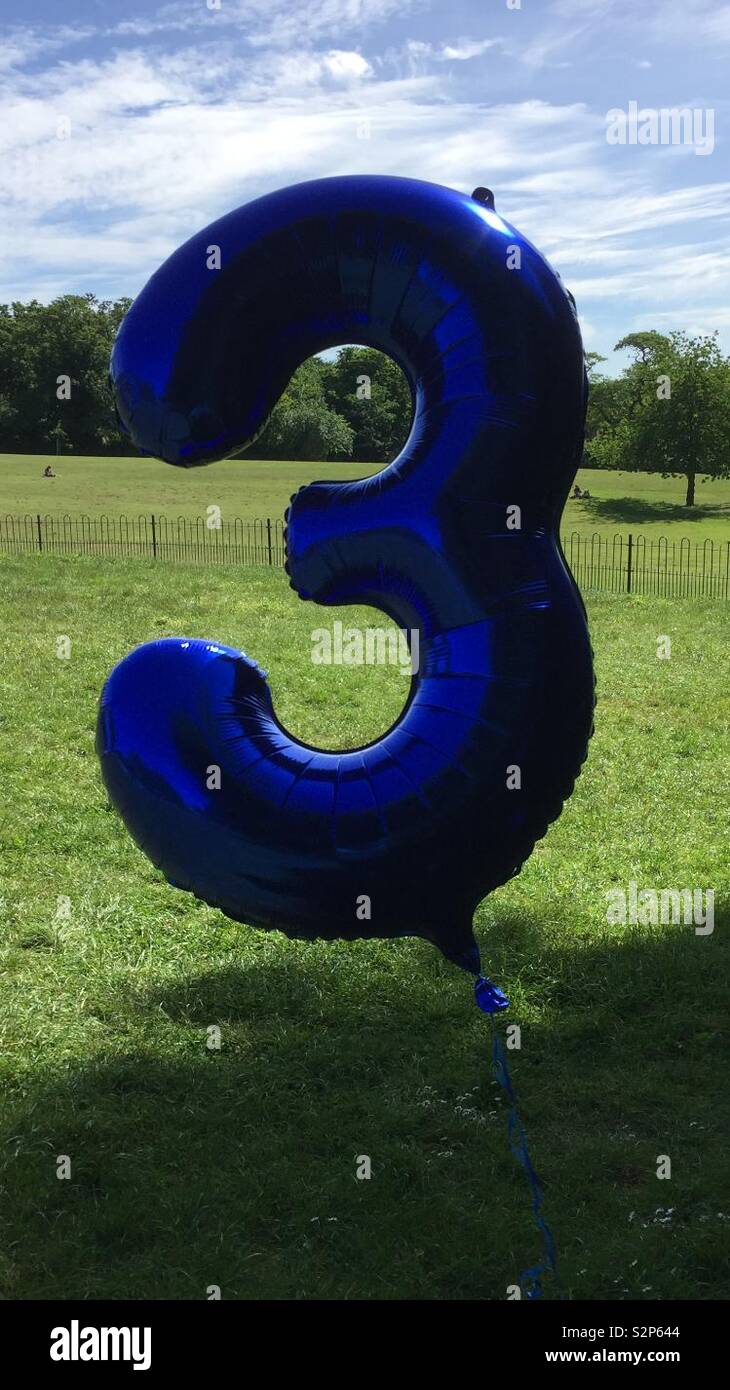Blue 3 balloon in Crystal Palace Park June 2019 Stock Photo - Alamy