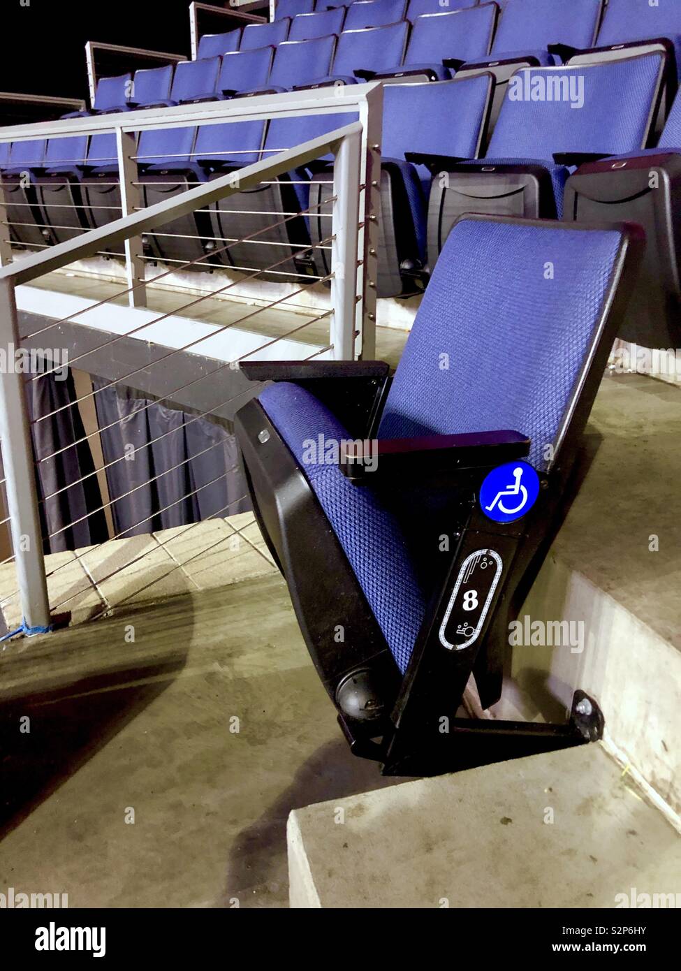 Handicap stadium seat Stock Photo - Alamy