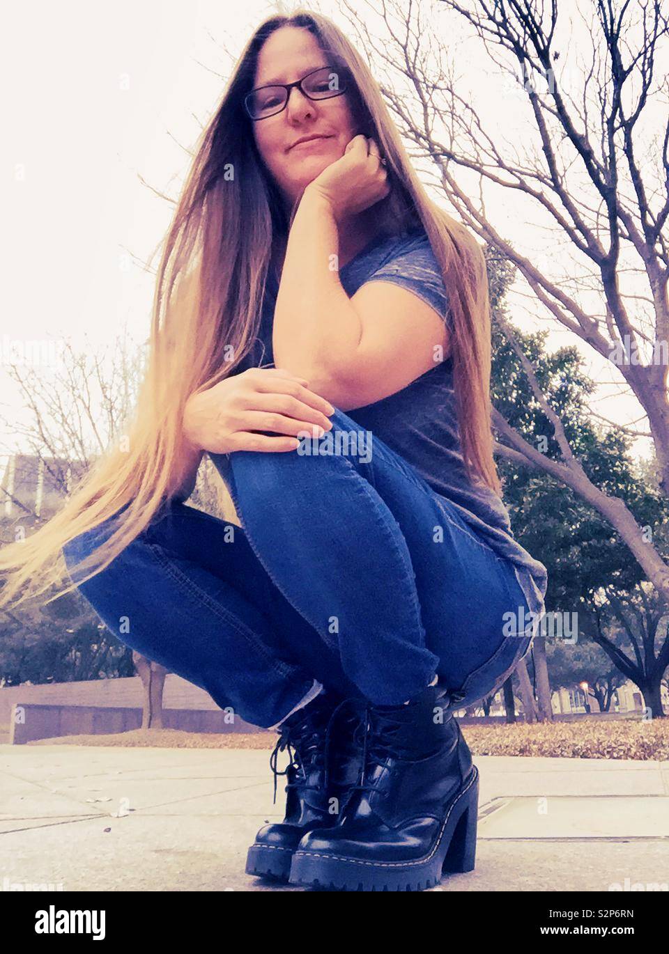 Squatting lady hi-res stock photography and images - Alamy