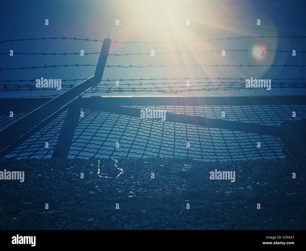 Prison fence hi-res stock photography and images - Alamy