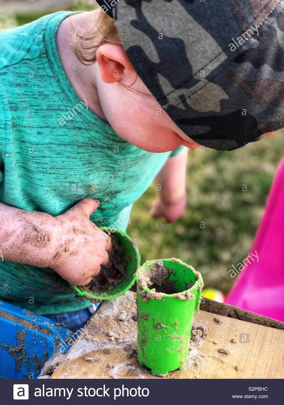 Boy playing sand hi-res stock photography and images - Alamy