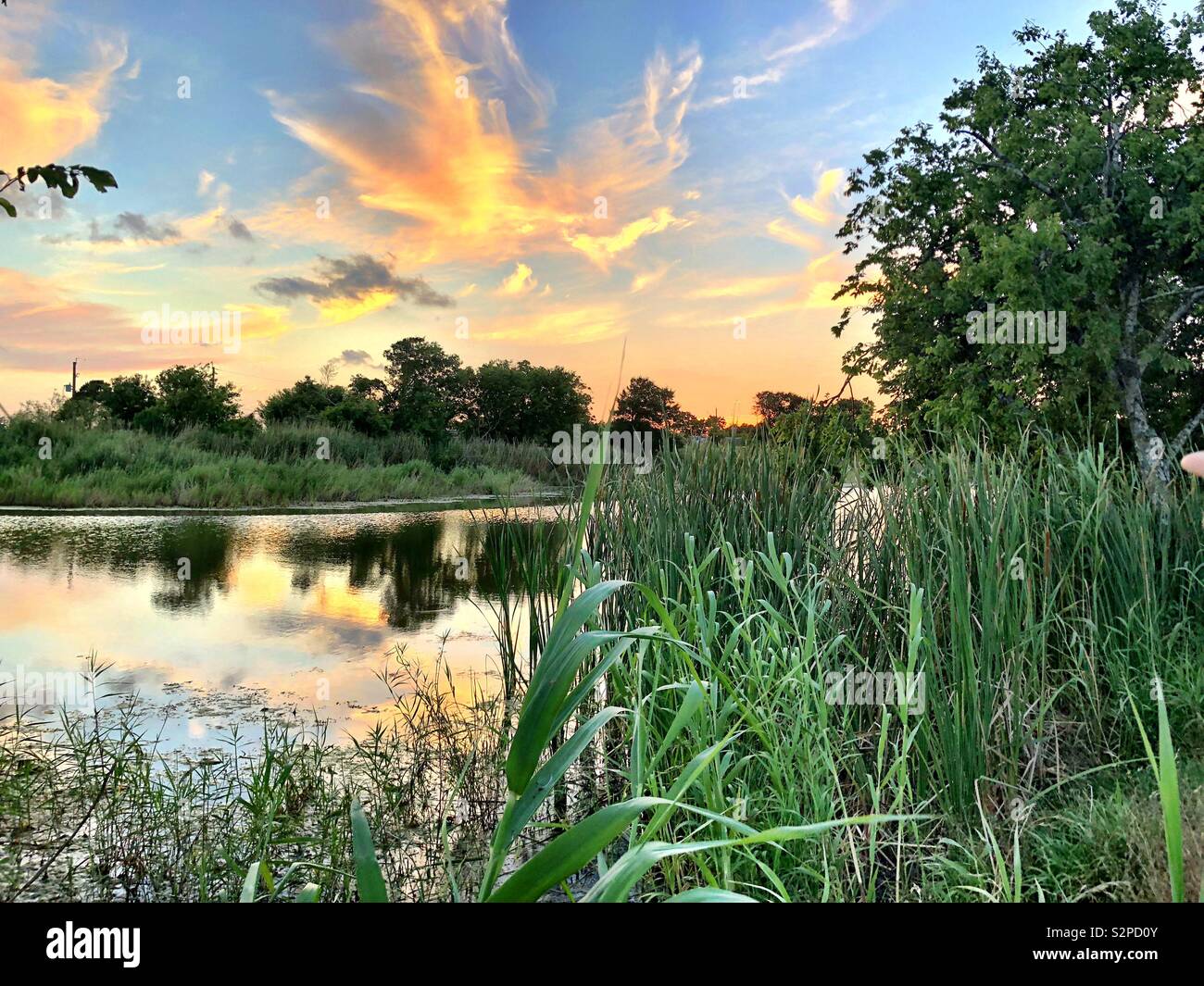 Sunset on the water Stock Photo - Alamy