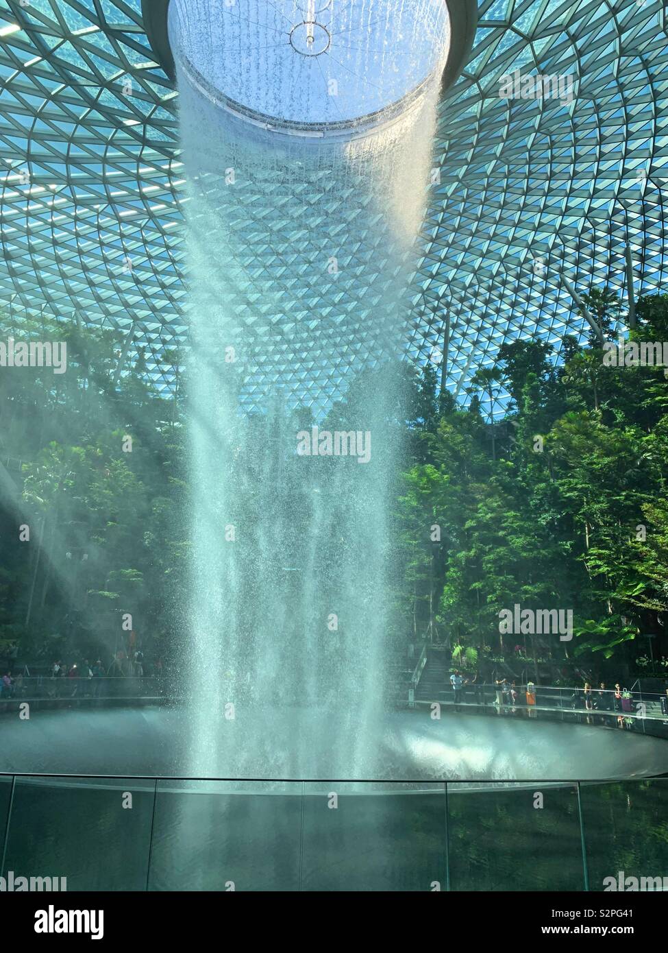 Jewel waterfall at Changi airport in Singapore dazzling in the sunlight ...