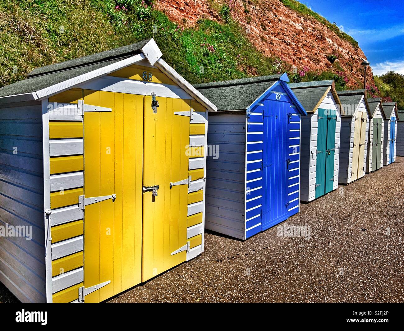 Beach huts in Seaton in Devon on the beautiful Jurassic Coast Stock ...