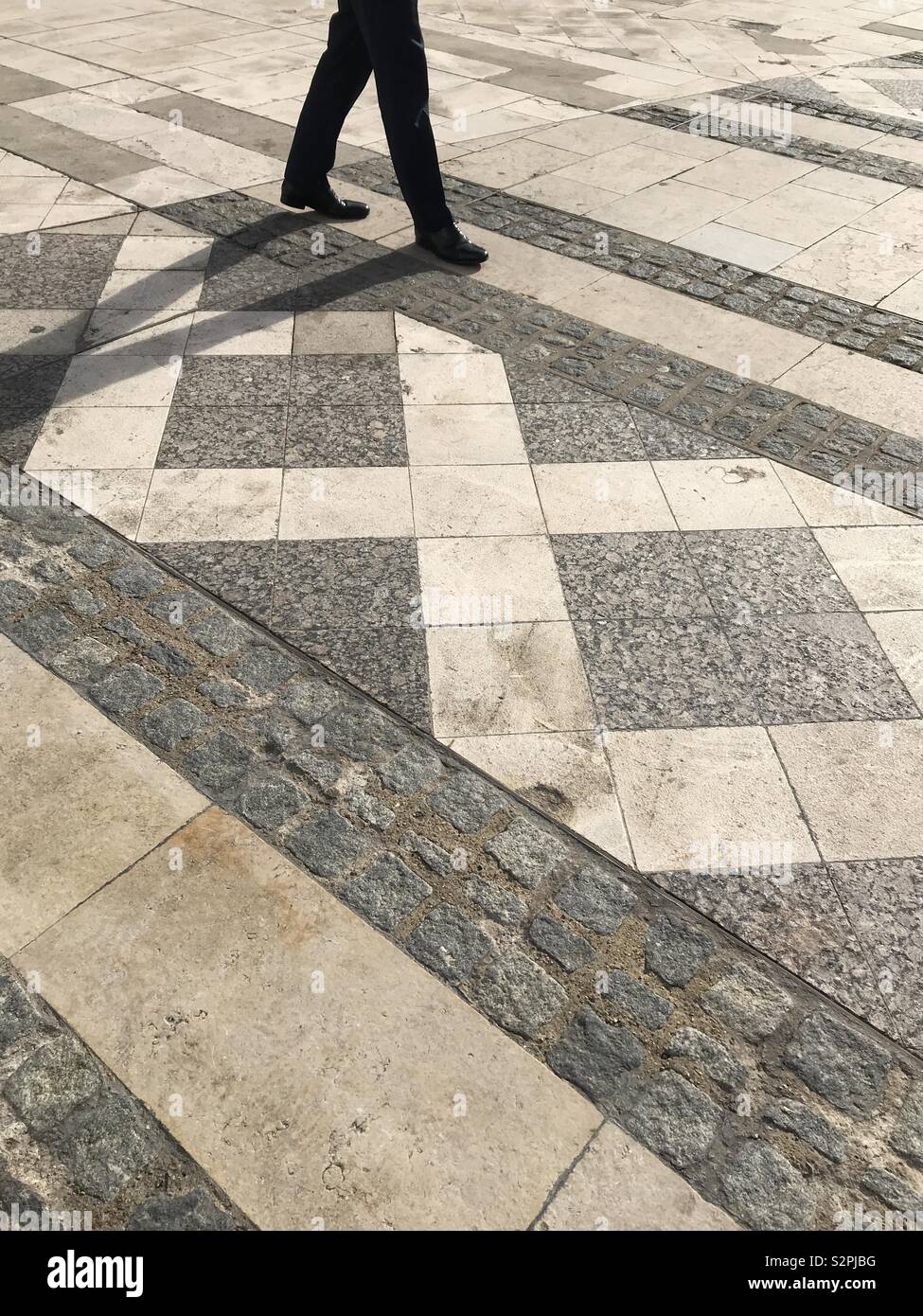 Man walking across Guildhall square, London Stock Photo - Alamy