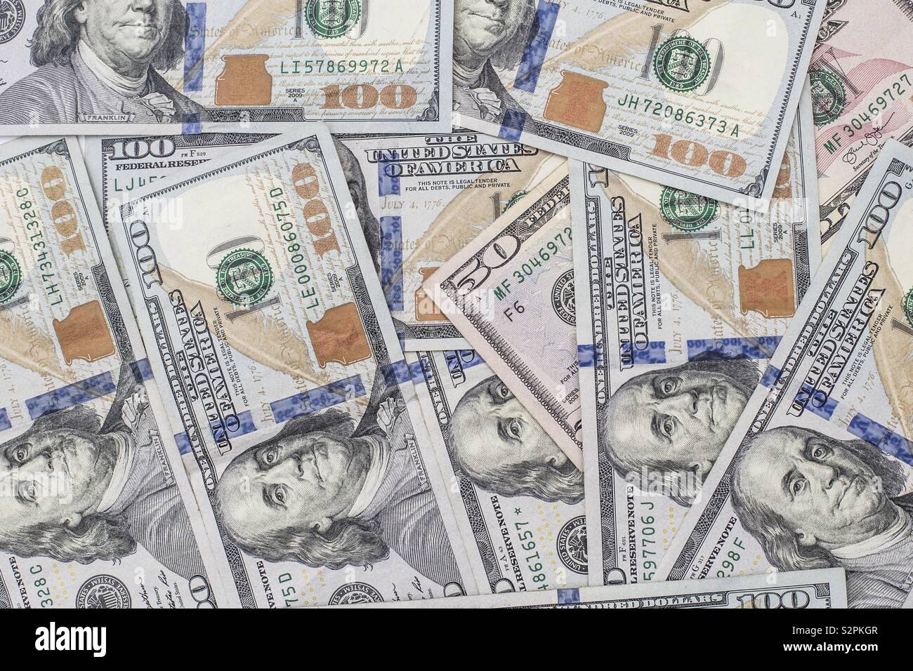 Flat lay of cash Stock Photo - Alamy