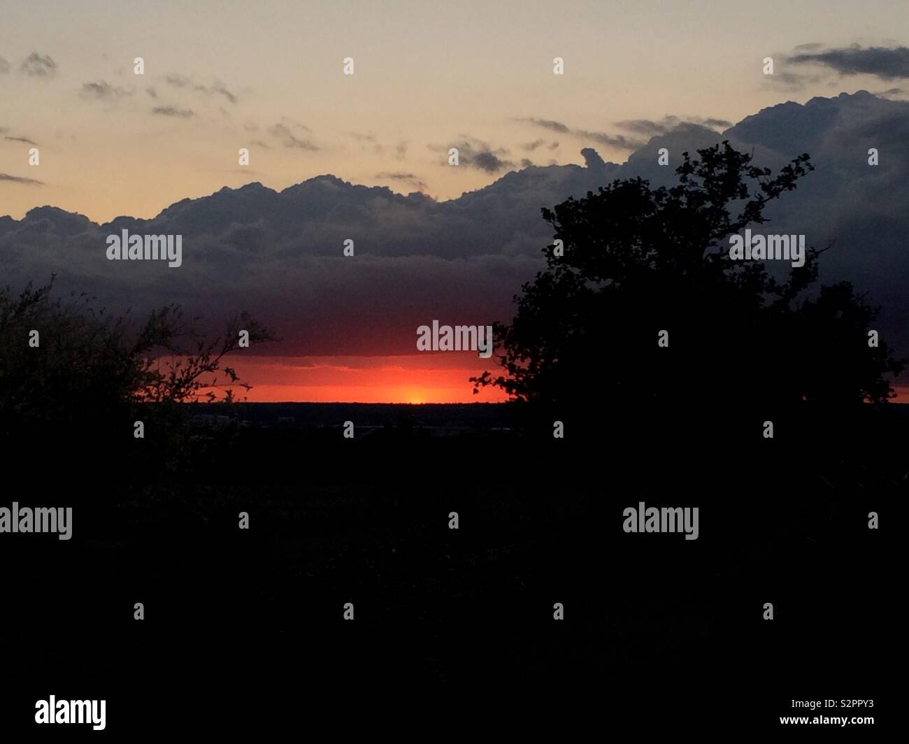 Fire sunset sky Stock Photo - Alamy