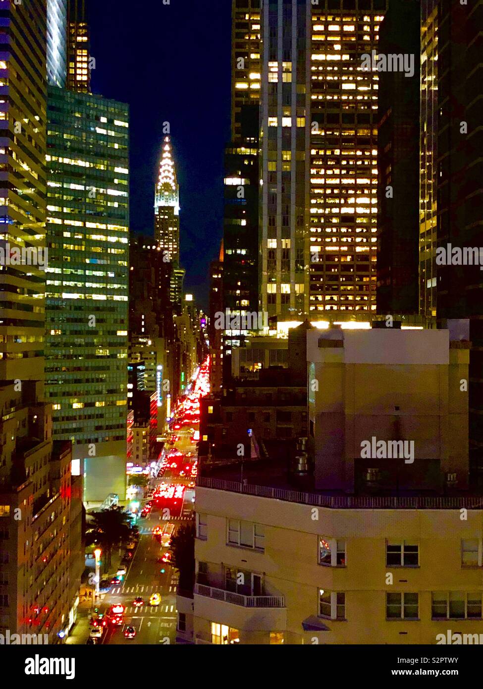 Chrysler Building New York City with Street traffic at night Stock ...