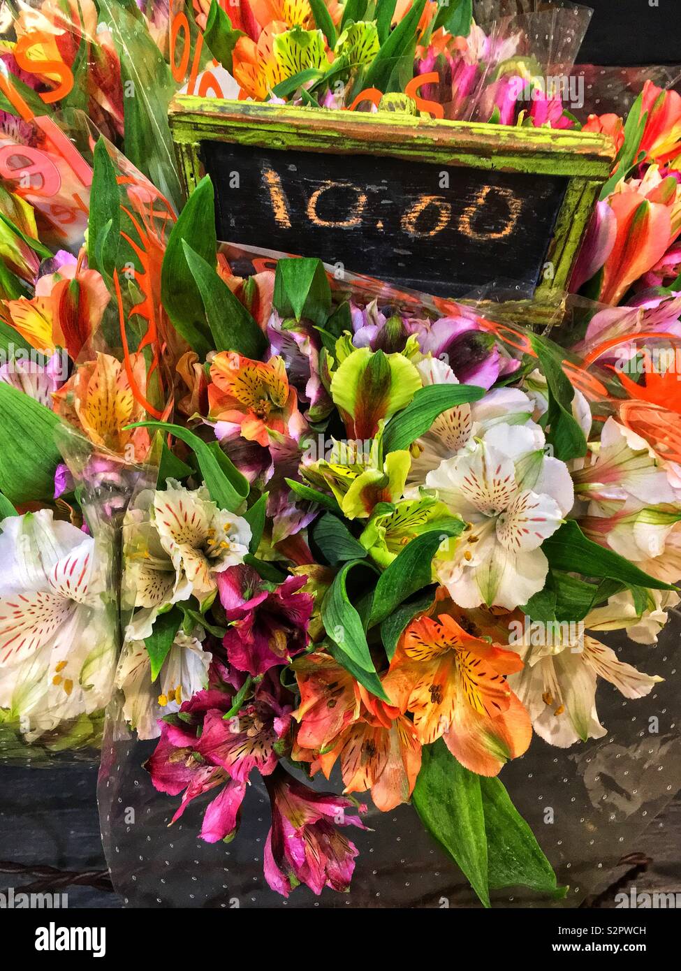 Bouquets of fresh colorful flowers with a 10.00 sign Stock Photo - Alamy
