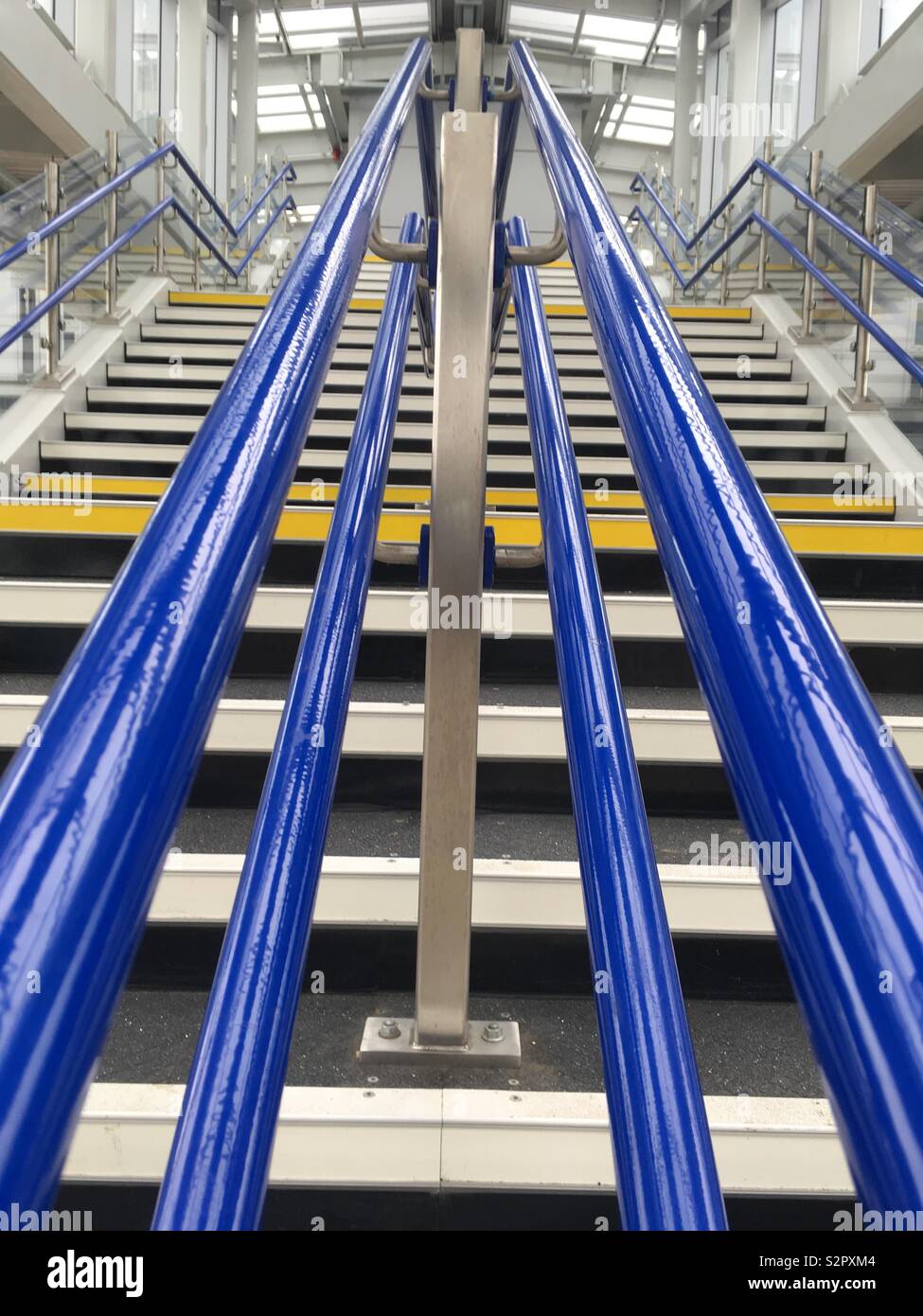 Stairs and railings leading from platform to concourse at Derby train ...
