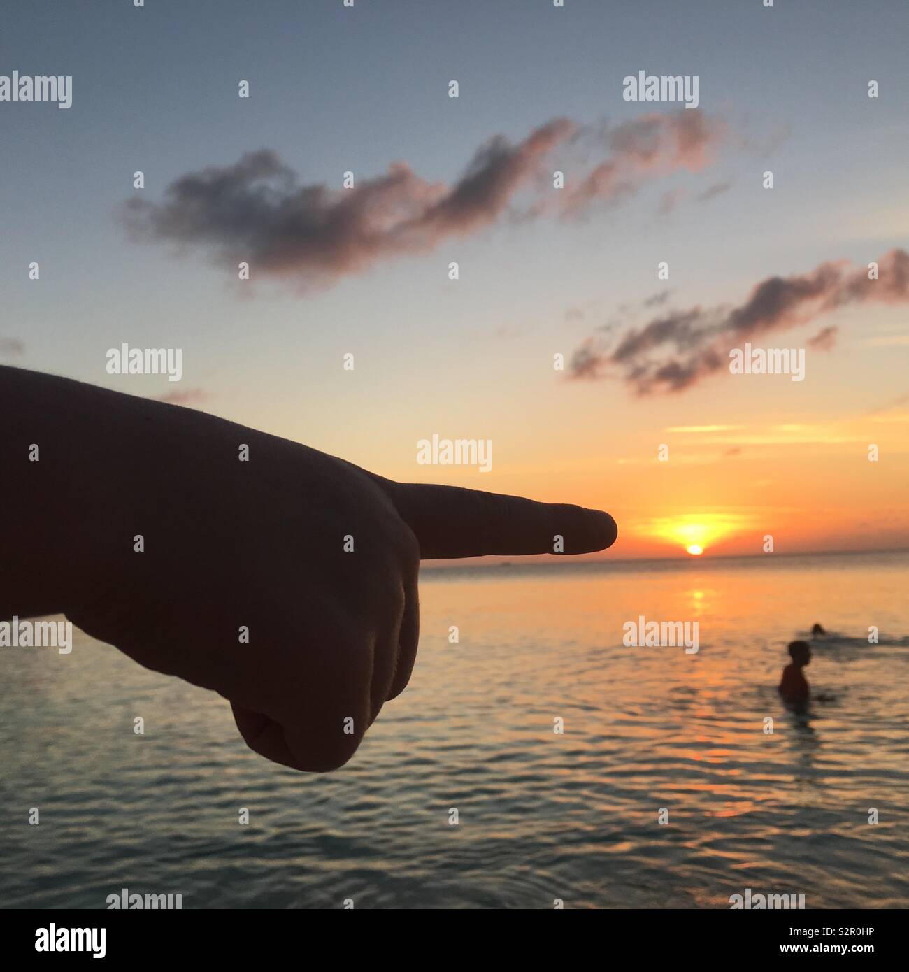 Pointing at the sunset hi-res stock photography and images - Alamy
