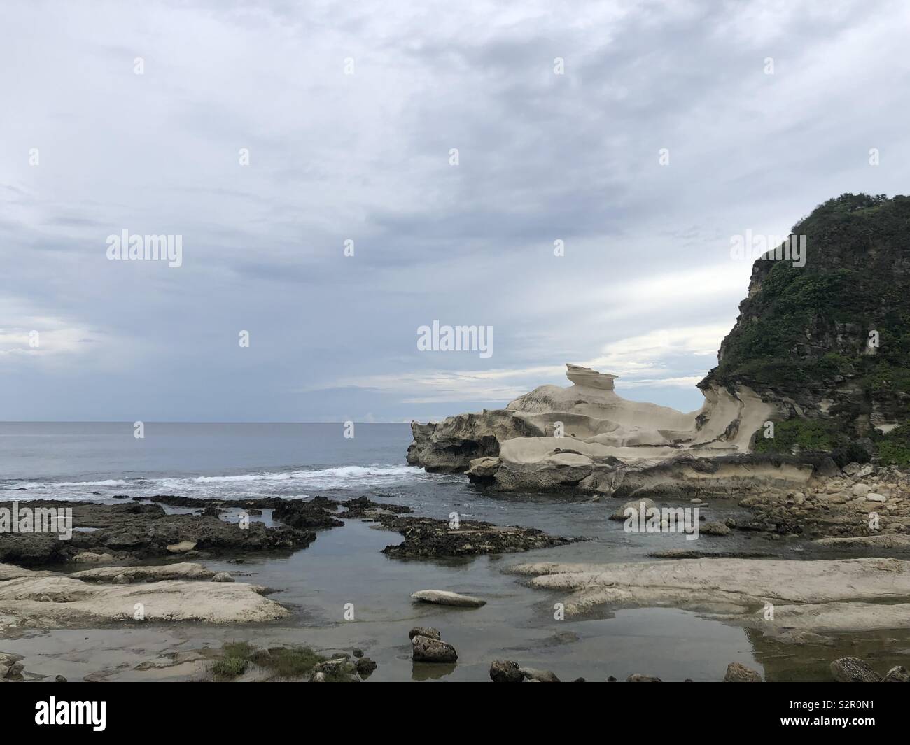 Kapurpurawan white rock formation is a famous travel sightseeing in ...