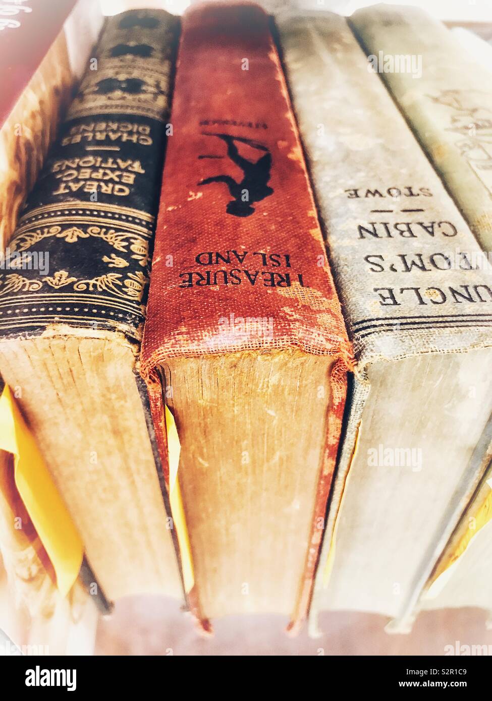 Display of worn classic books Stock Photo - Alamy