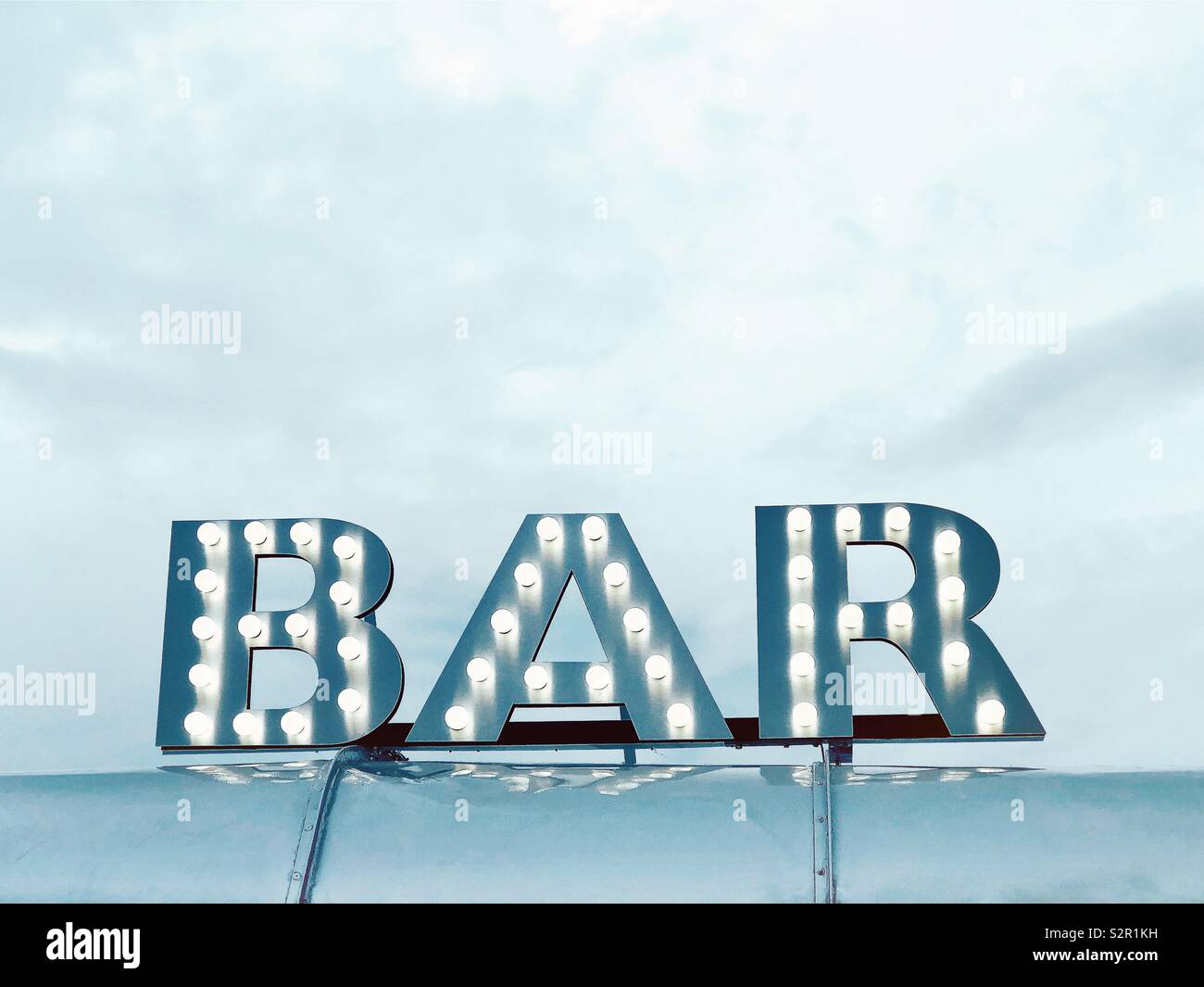 Illuminated bar sign Stock Photo - Alamy