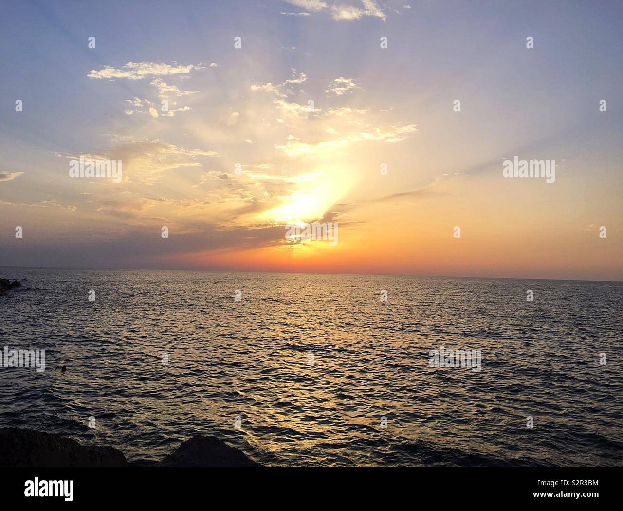Sunset on the beautiful sea of Alexandria, Egypt Stock Photo - Alamy